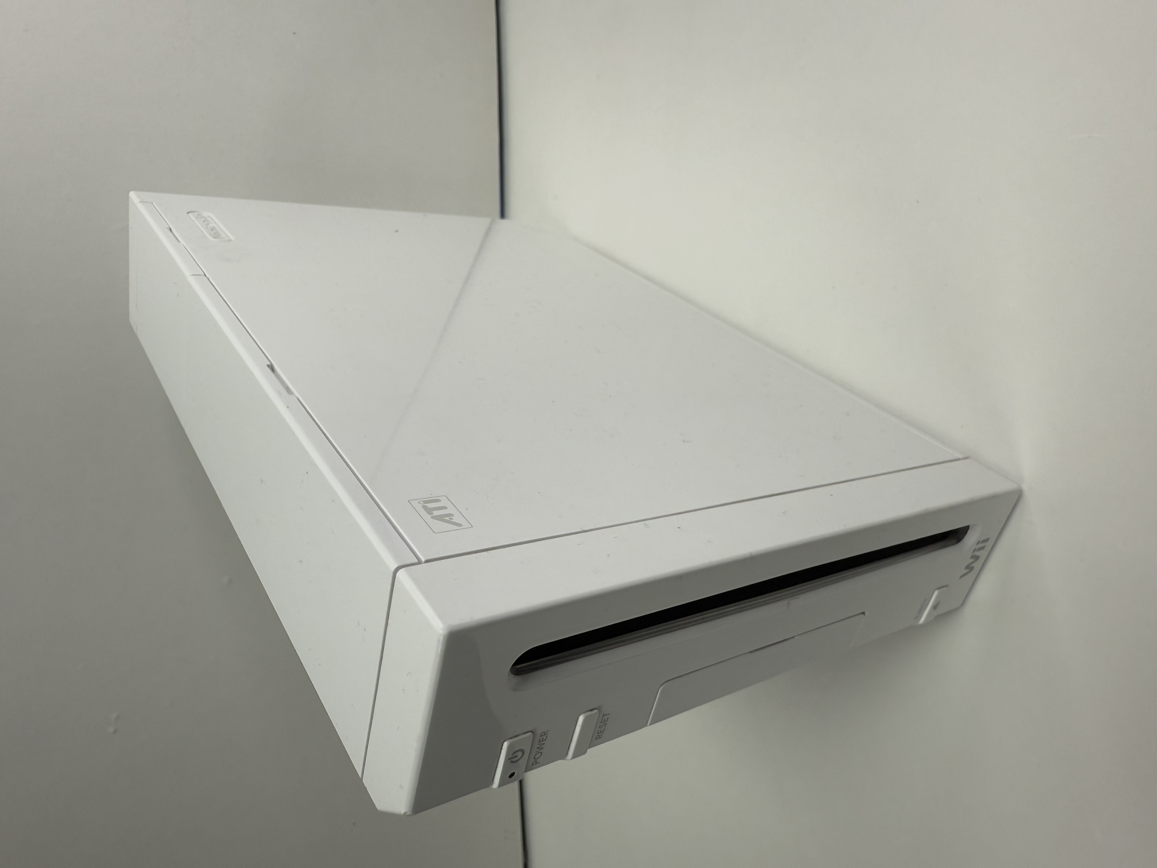 Pre-owned WII wii console with extra cons - Own4Less